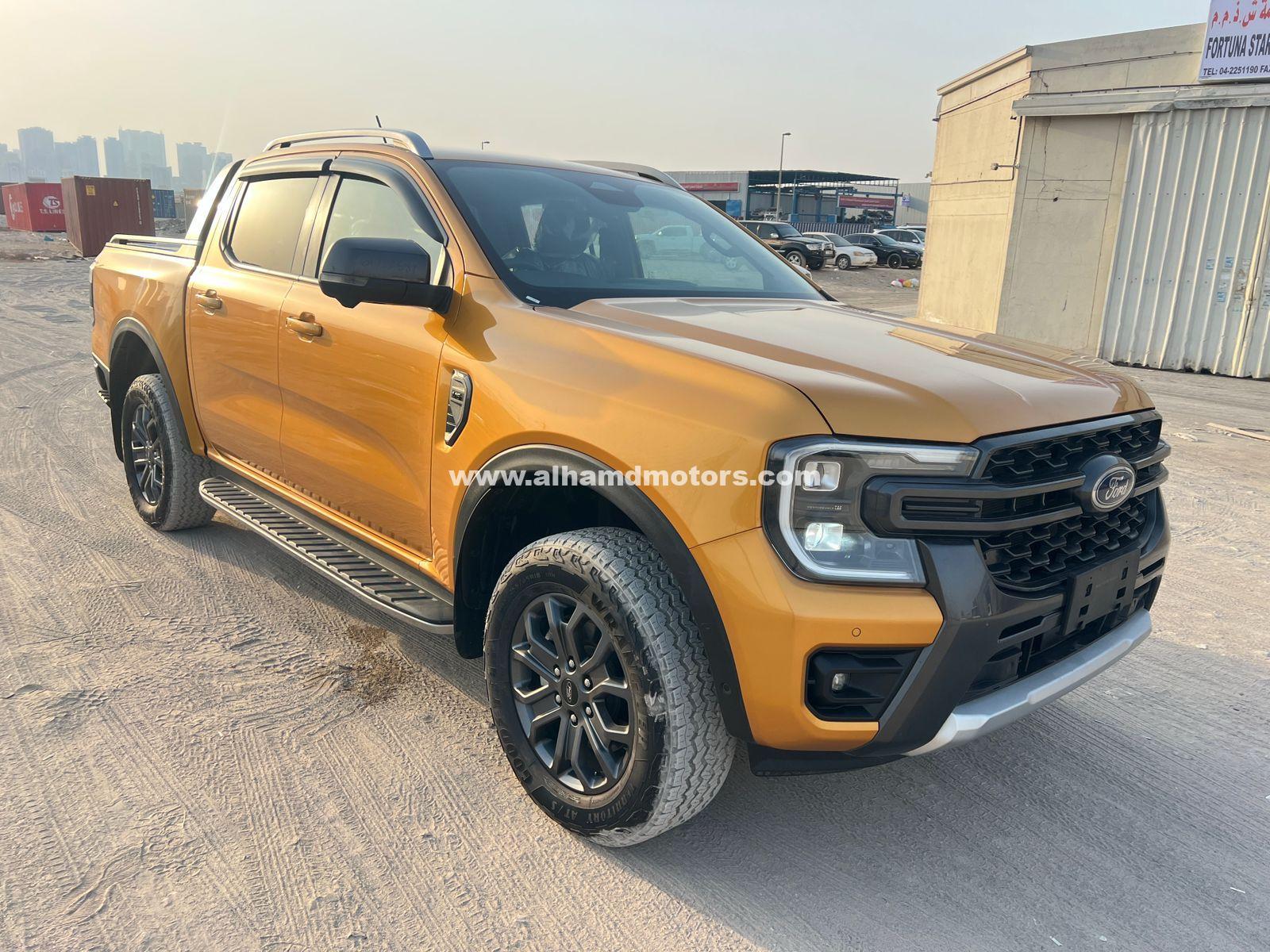FORD RANGER 2022 ORANGE 4WD AT DIESEL = RIGHT HAND - Alhamd Motors FZCO